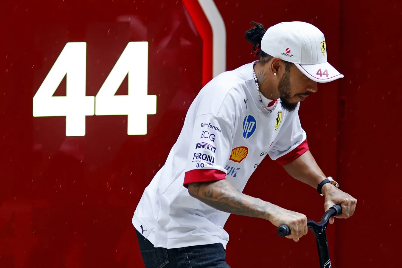 Lewis Hamilton debuts new Perplexity sponsorship on Ferrari helmet amid ...