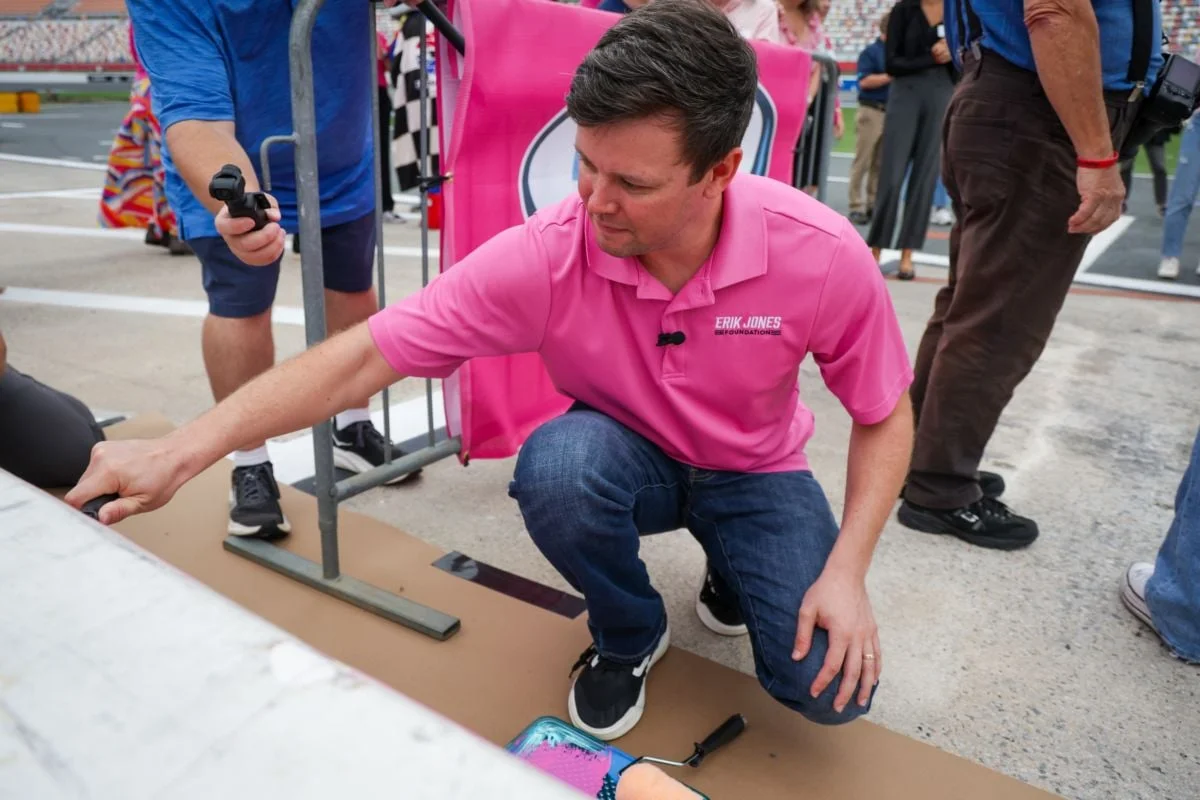 Erik Jones Joins Survivors to Paint NASCAR Pit Wall Pink